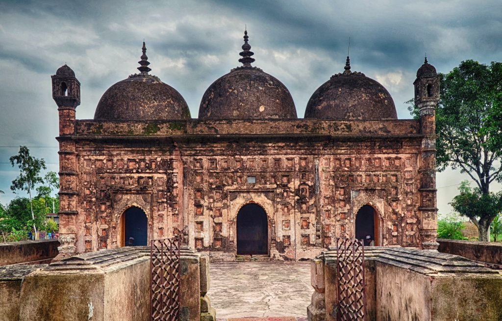 The serene arches and minarets of Nayabad Mosque, a Mughal-era gem near ...
